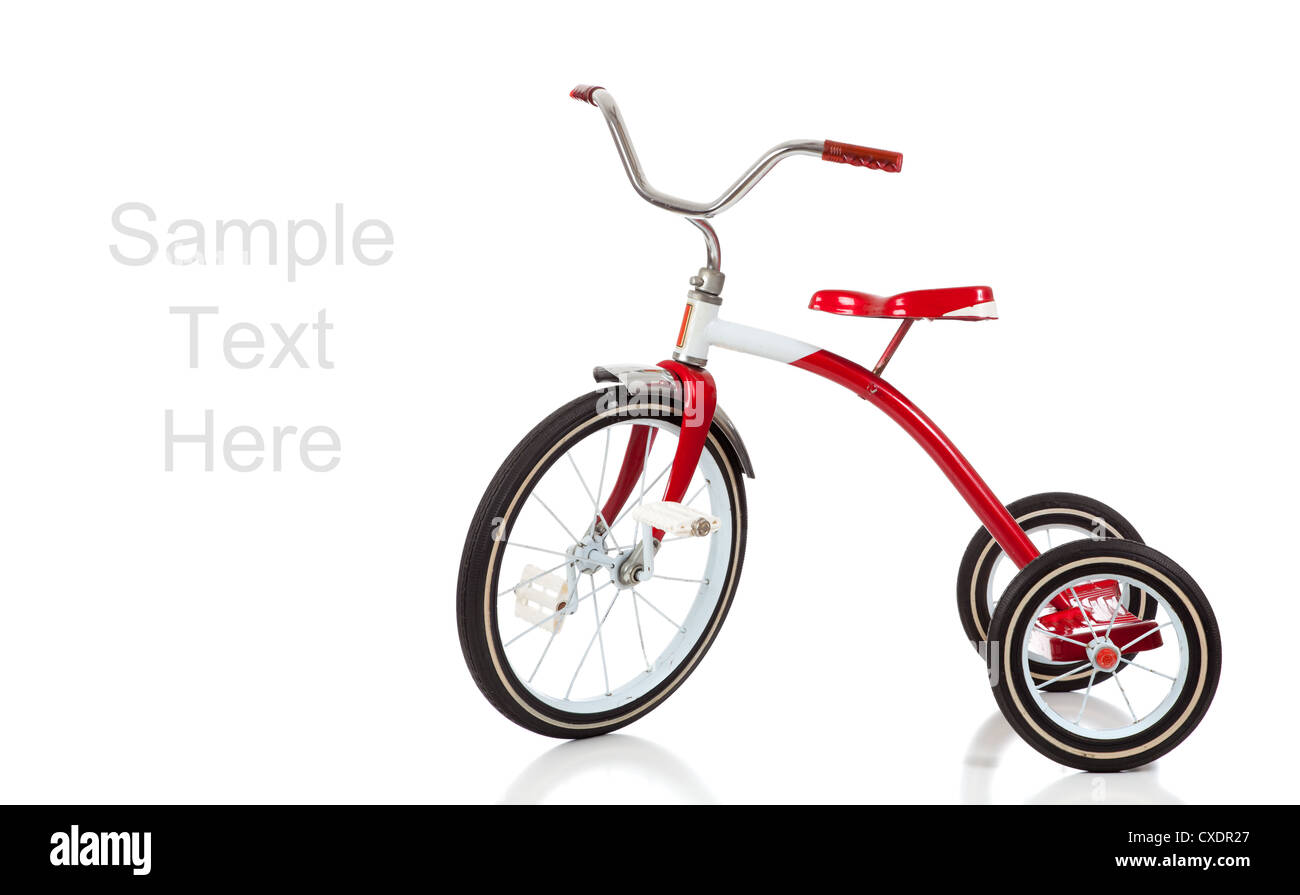 A red tricycle on a white background with copy space Stock Photo - Alamy