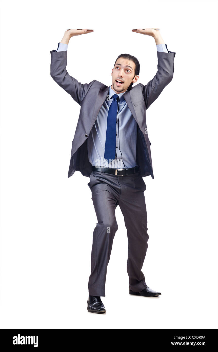 Young businessman pushing invisible obstacles Stock Photo - Alamy