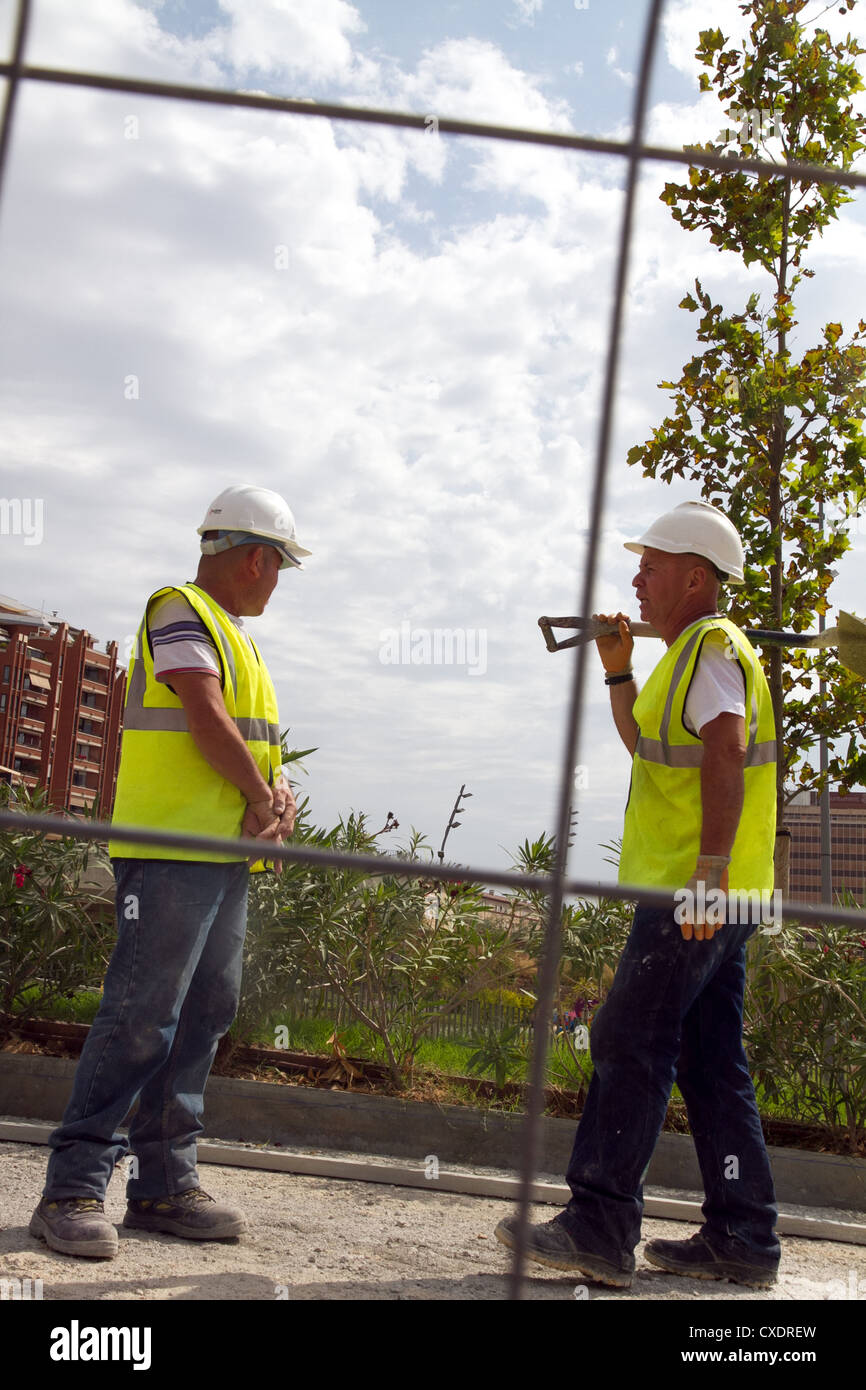 construction workers working in street Stock Photo - Alamy