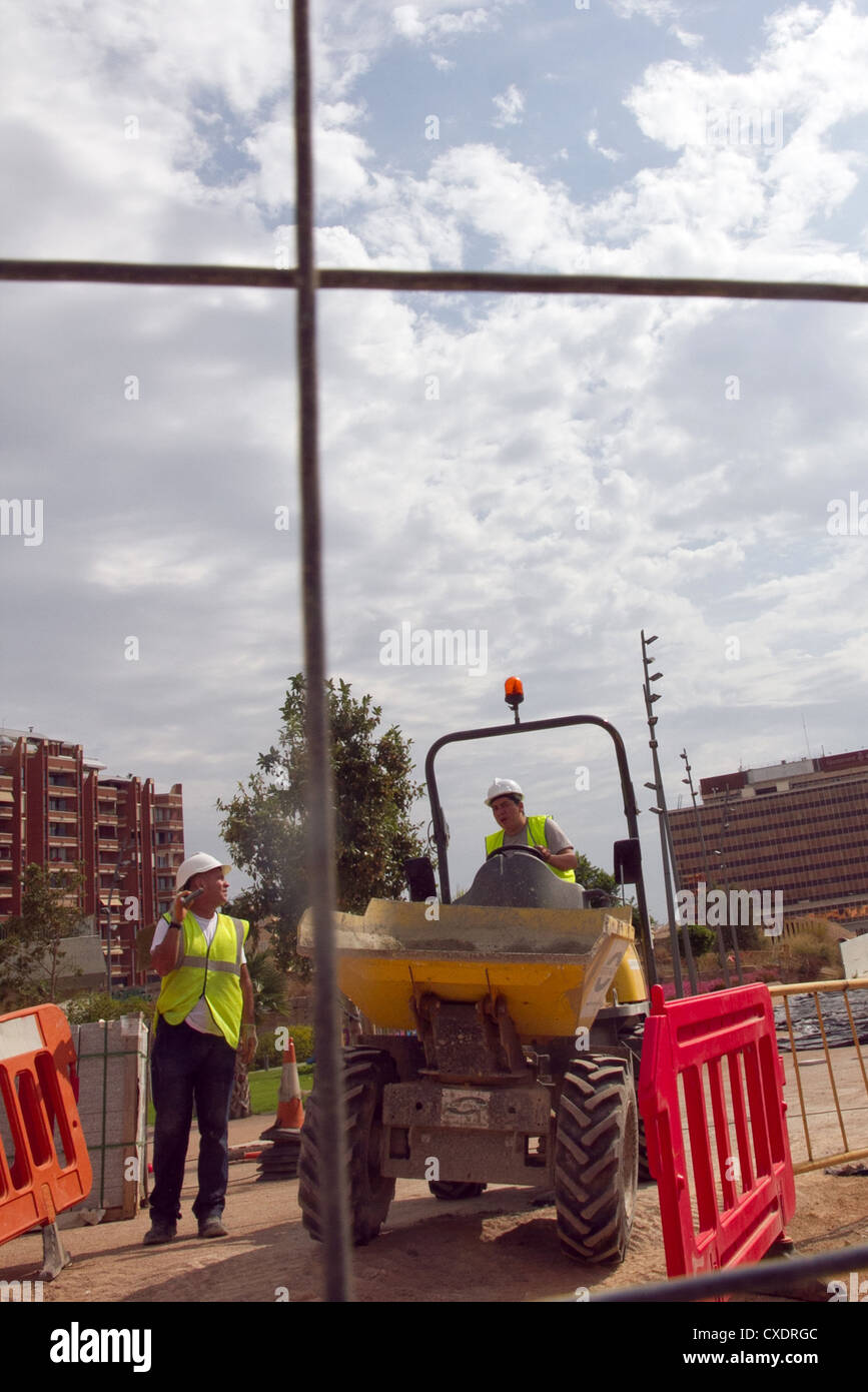 construction workers working in street Stock Photo - Alamy