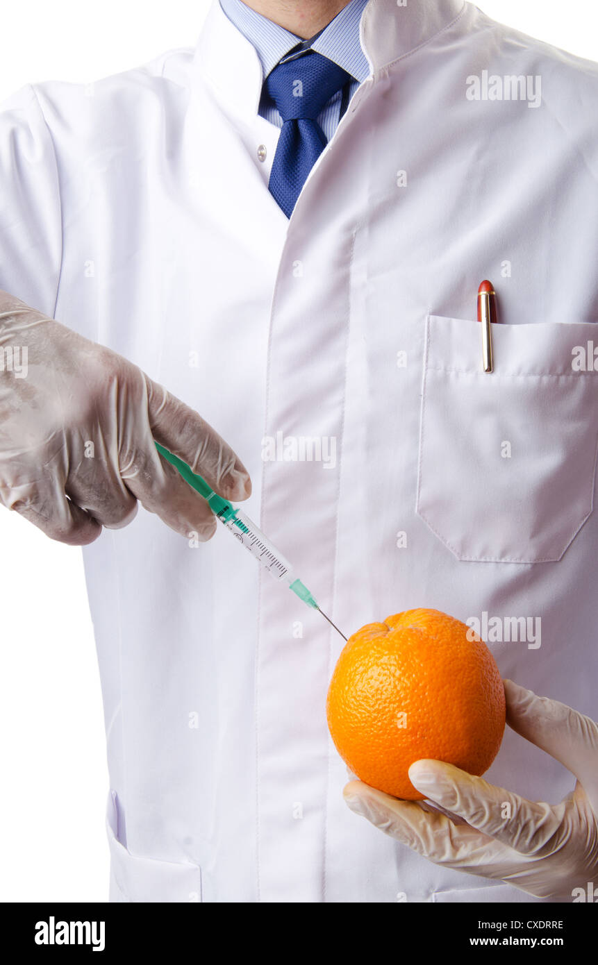 Science experiment with orange and syringe Stock Photo - Alamy