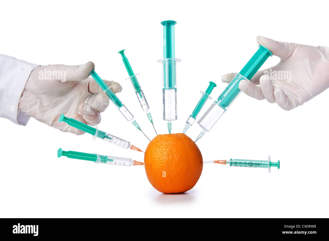 Science experiment with orange and syringe Stock Photo - Alamy