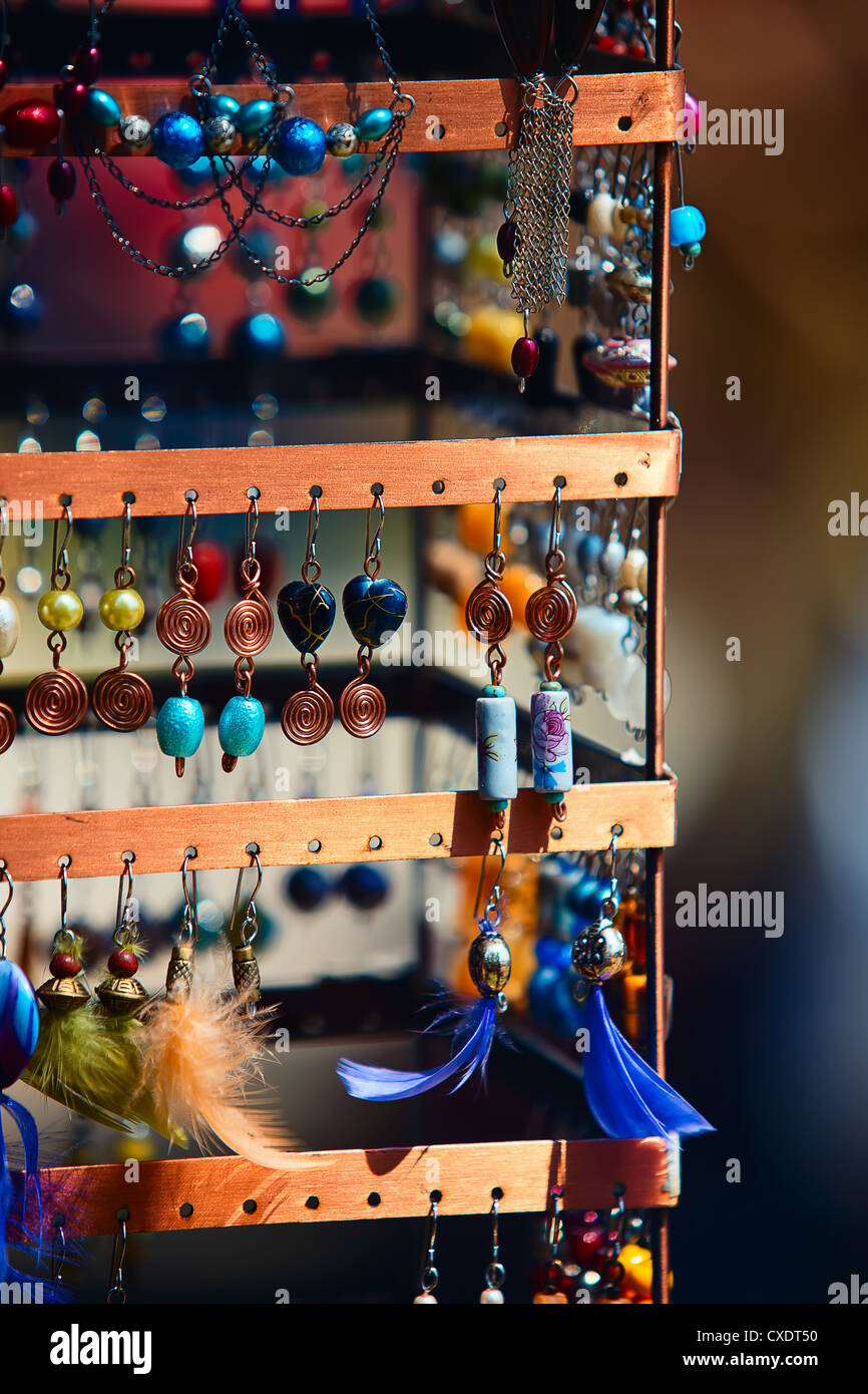 Different types of beautiful colored earrings Stock Photo - Alamy