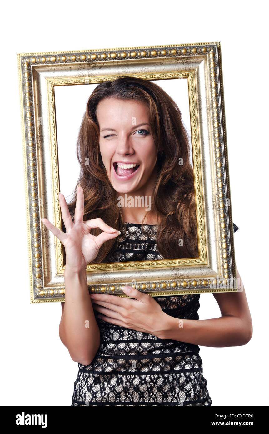 Young woman with picture frame on white Stock Photo - Alamy