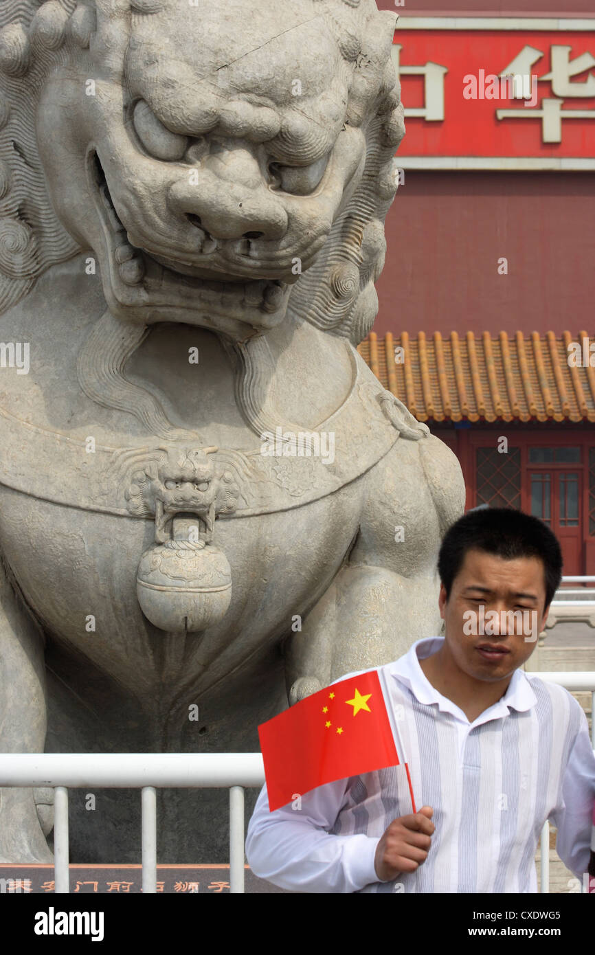 Beijing, China-man flag before Loewen Stock Photo - Alamy