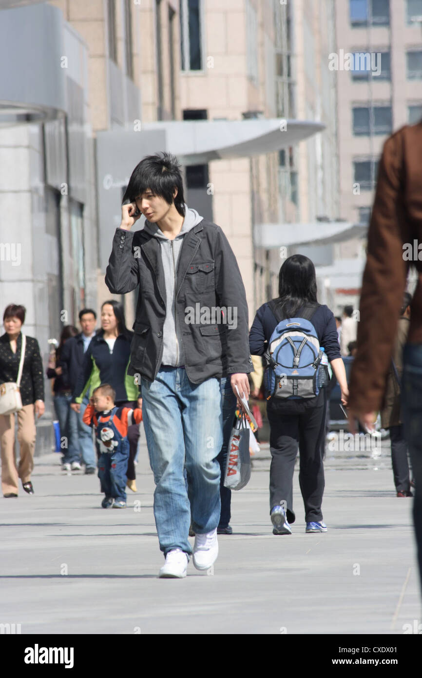 Beijing, young people on the Chang'an Boulevard Stock Photo - Alamy
