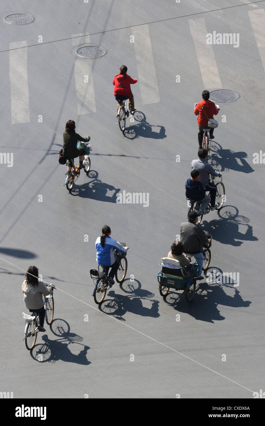 Beijing, cyclists will cross an intersection Stock Photo - Alamy