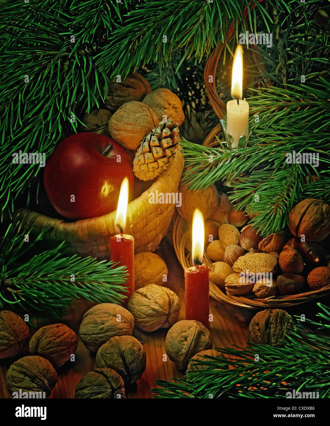 Christmas still life with an apples,nuts and candles Stock Photo - Alamy