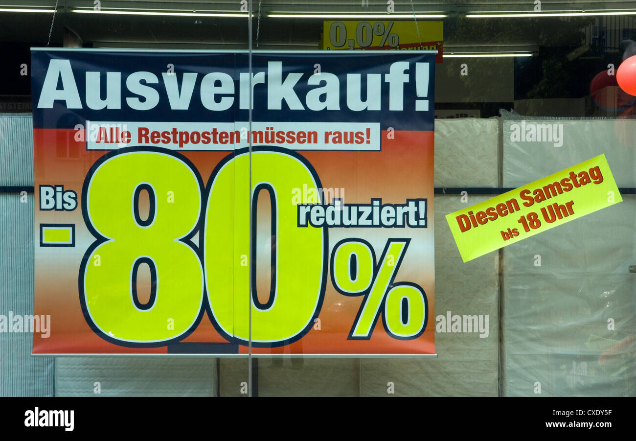 Berlin, a storefront with advertising Stock Photo - Alamy