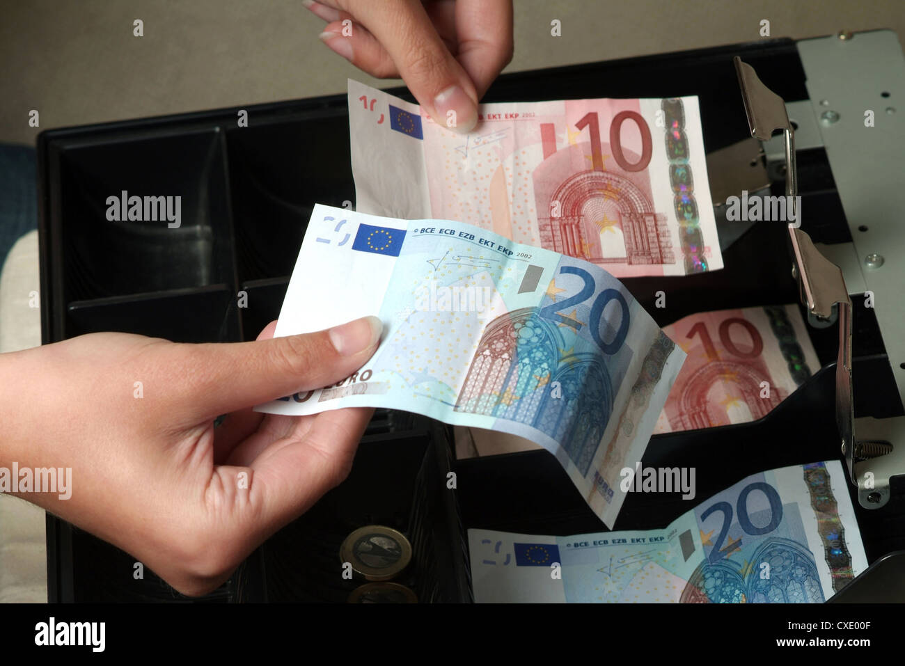 Berlin, cash register and euro notes Stock Photo - Alamy