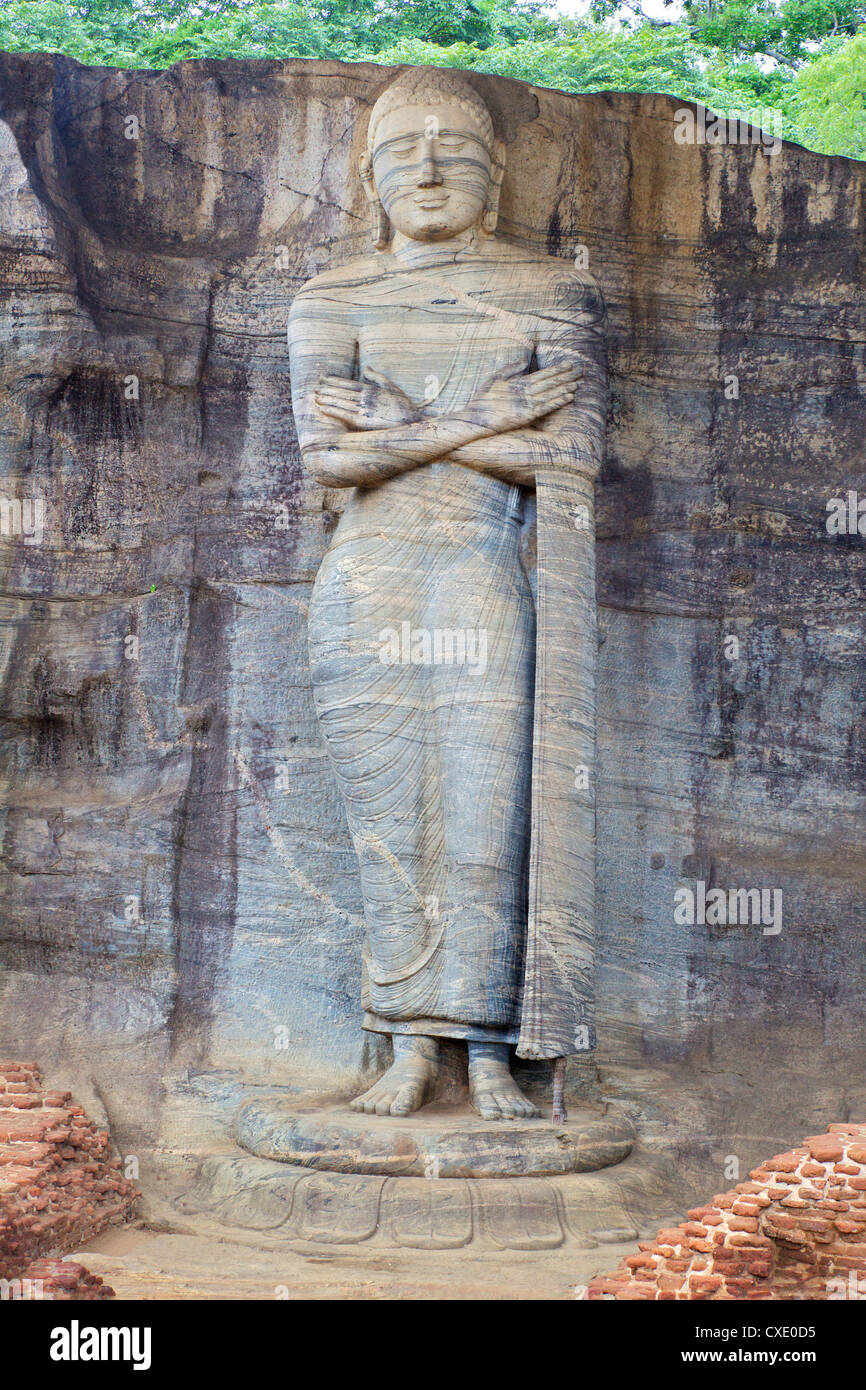 Buddha standing on lotus plinth in blessing posture, Gal Vihara Rock ...