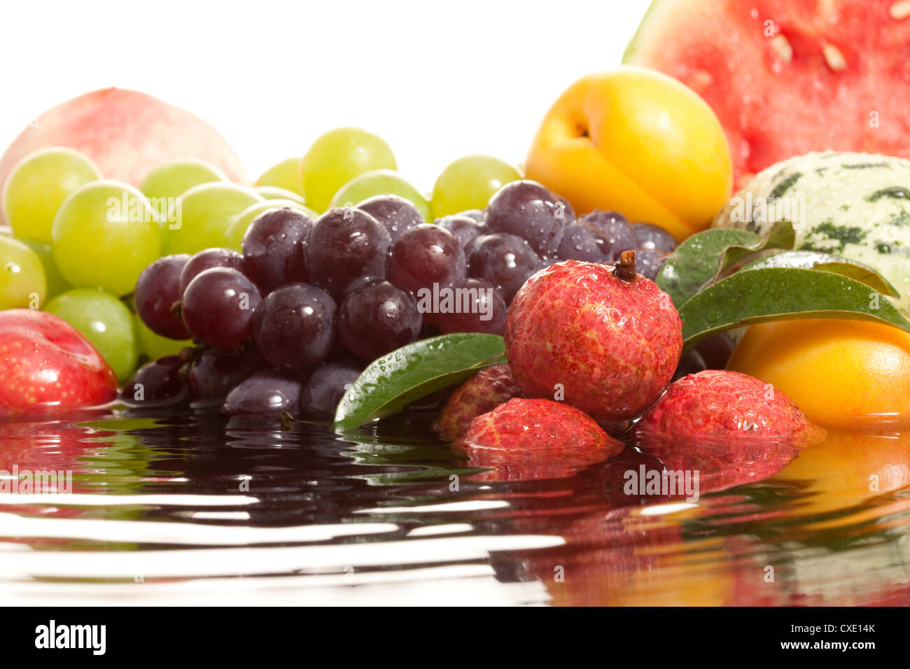 A pile of fruits in rippling water Stock Photo - Alamy