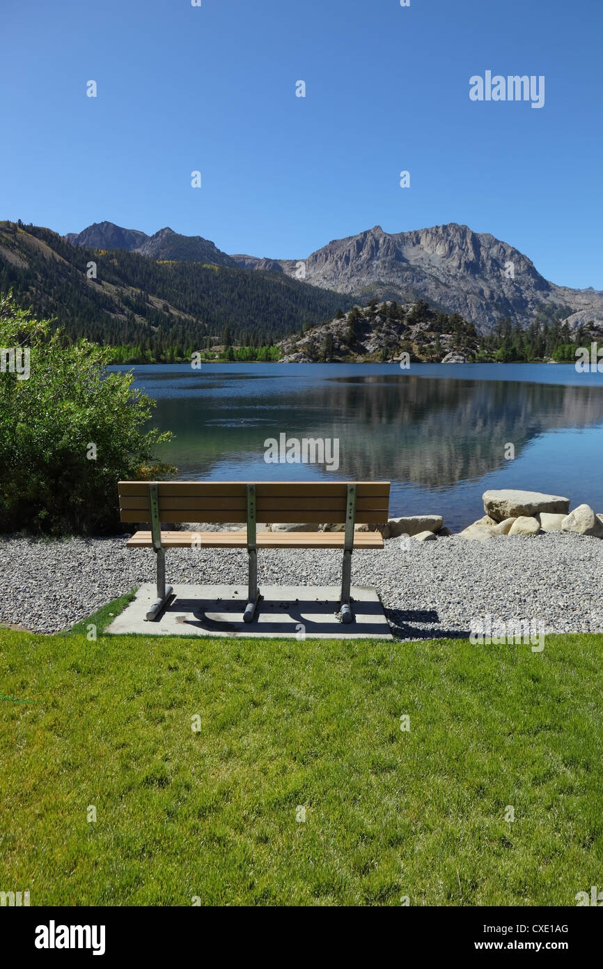 Cosy bench on the shore Stock Photo - Alamy