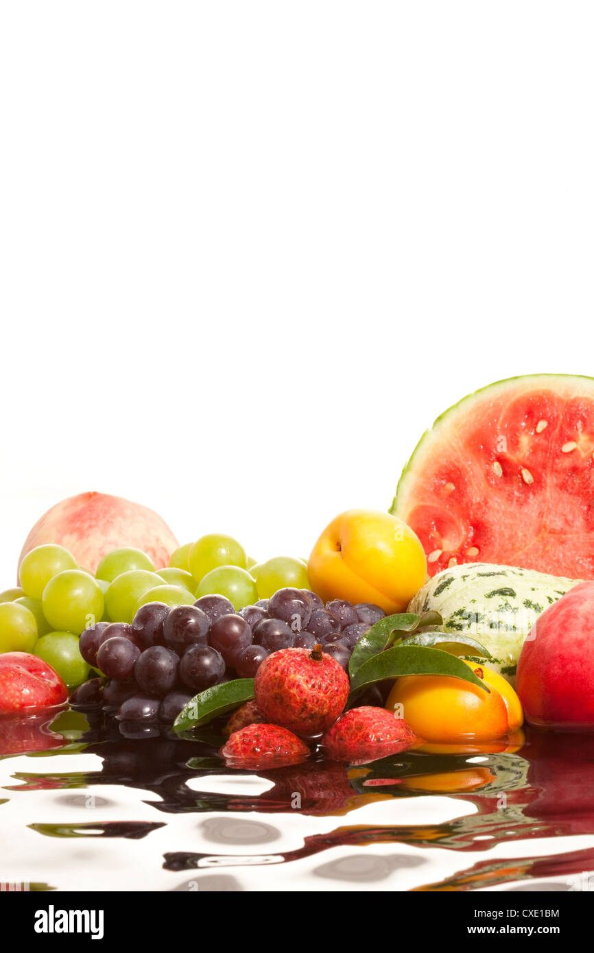 A pile of fruits in rippling water Stock Photo - Alamy