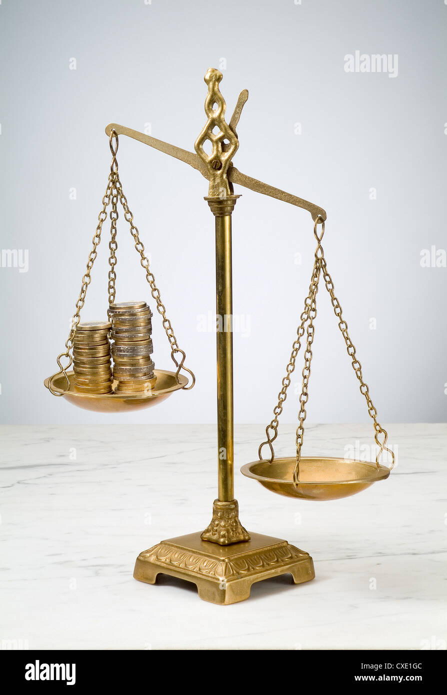 Balance Scales With Coins Stock Photos & Balance Scales With Coins ...