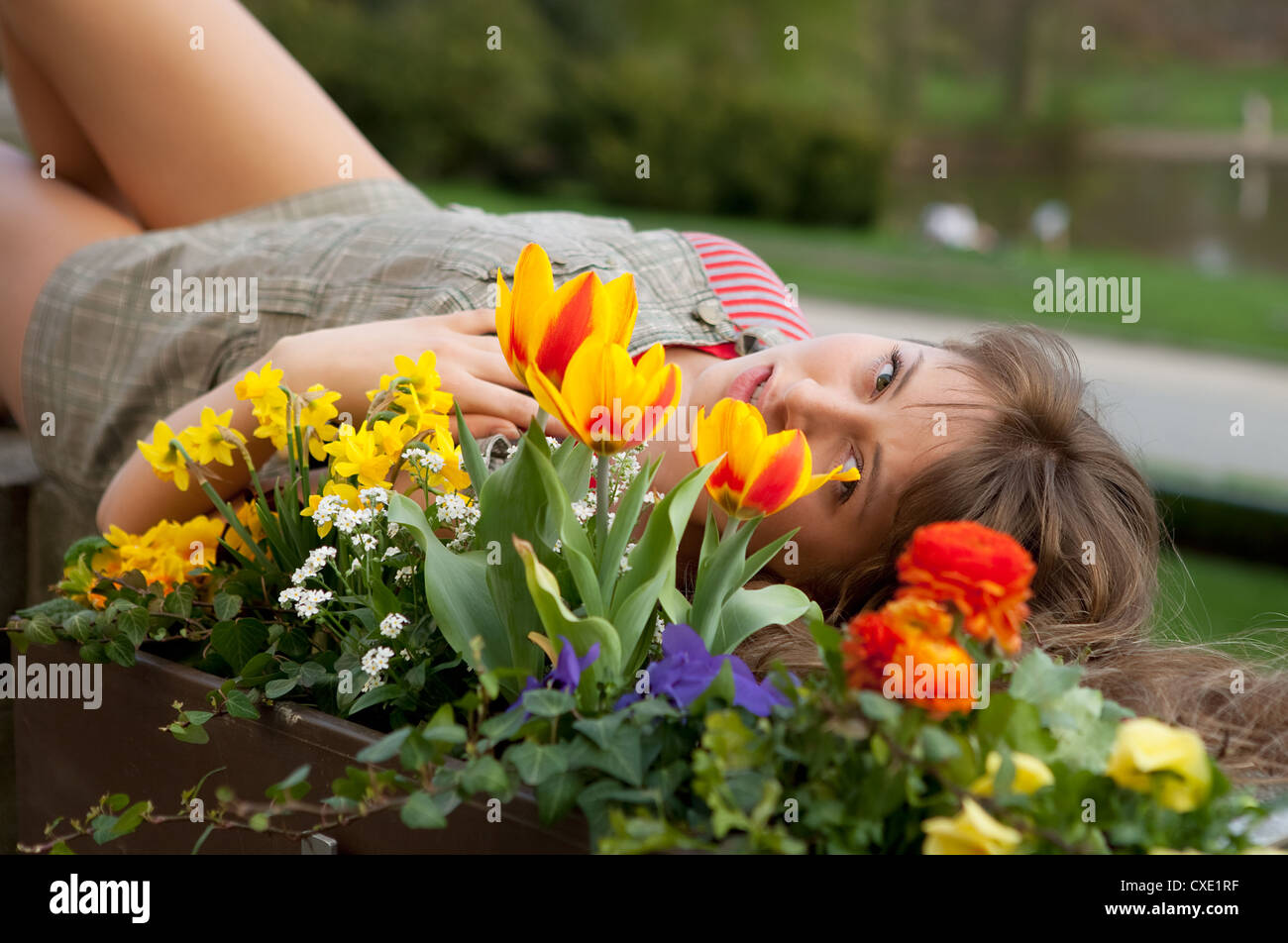 beautiful spring portrait with tulips Stock Photo - Alamy