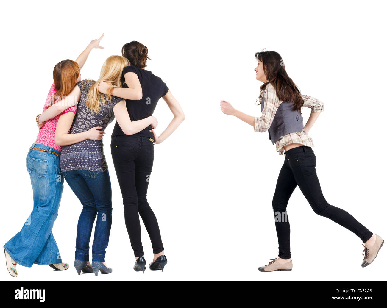 Back view of group pointing young women. girl hastens to join friends ...