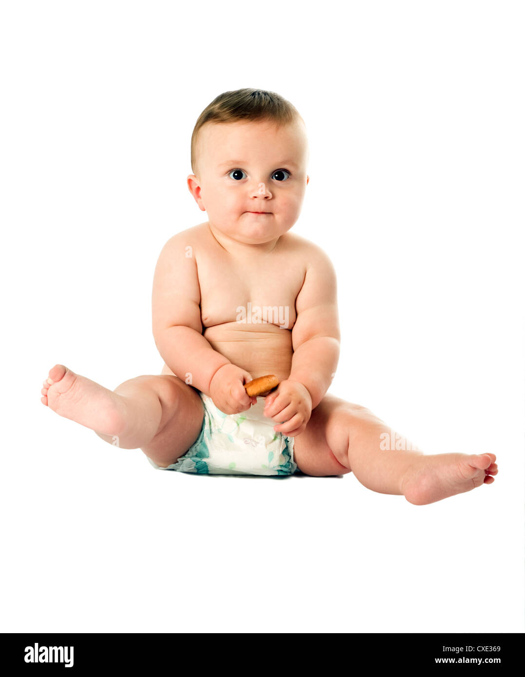 The baby laying on a floor Stock Photo - Alamy