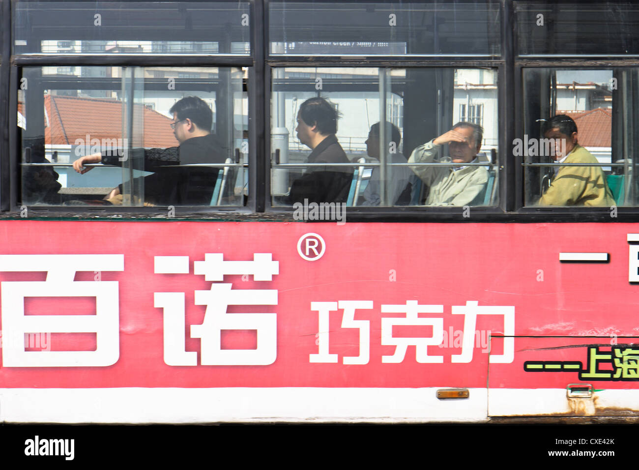 Shanghai, Passengers sit in a bus Stock Photo - Alamy