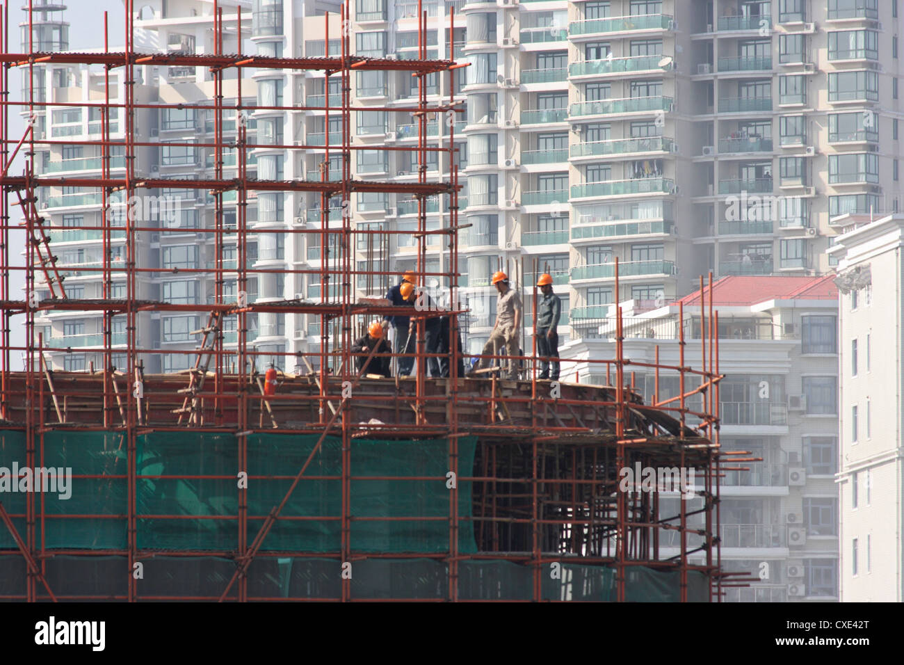 Shanghai, construction workers at a construction site Stock Photo - Alamy