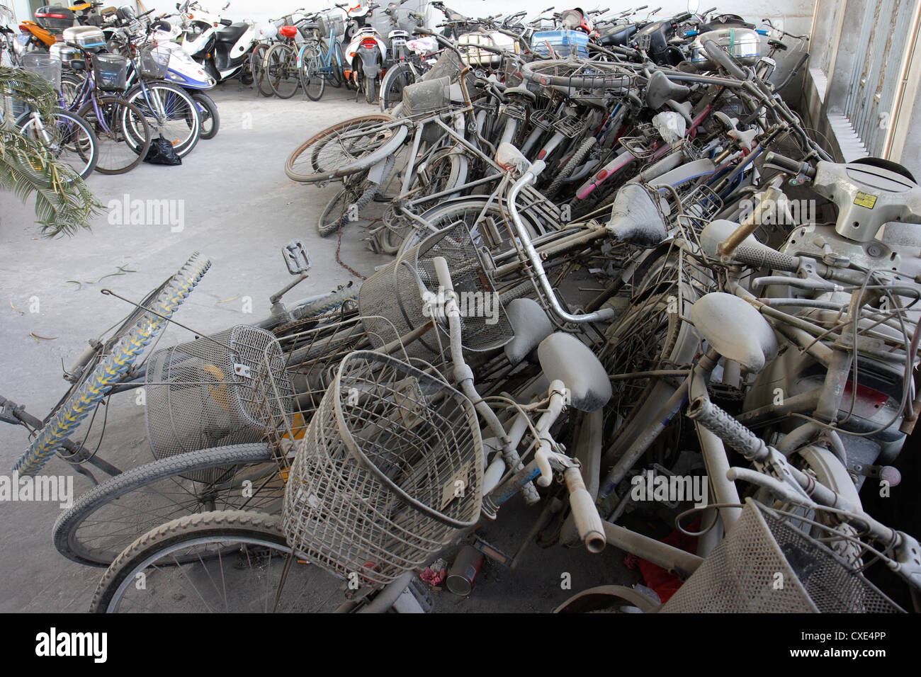 Shanghai, dusty bikes gathered at the main station Stock Photo - Alamy
