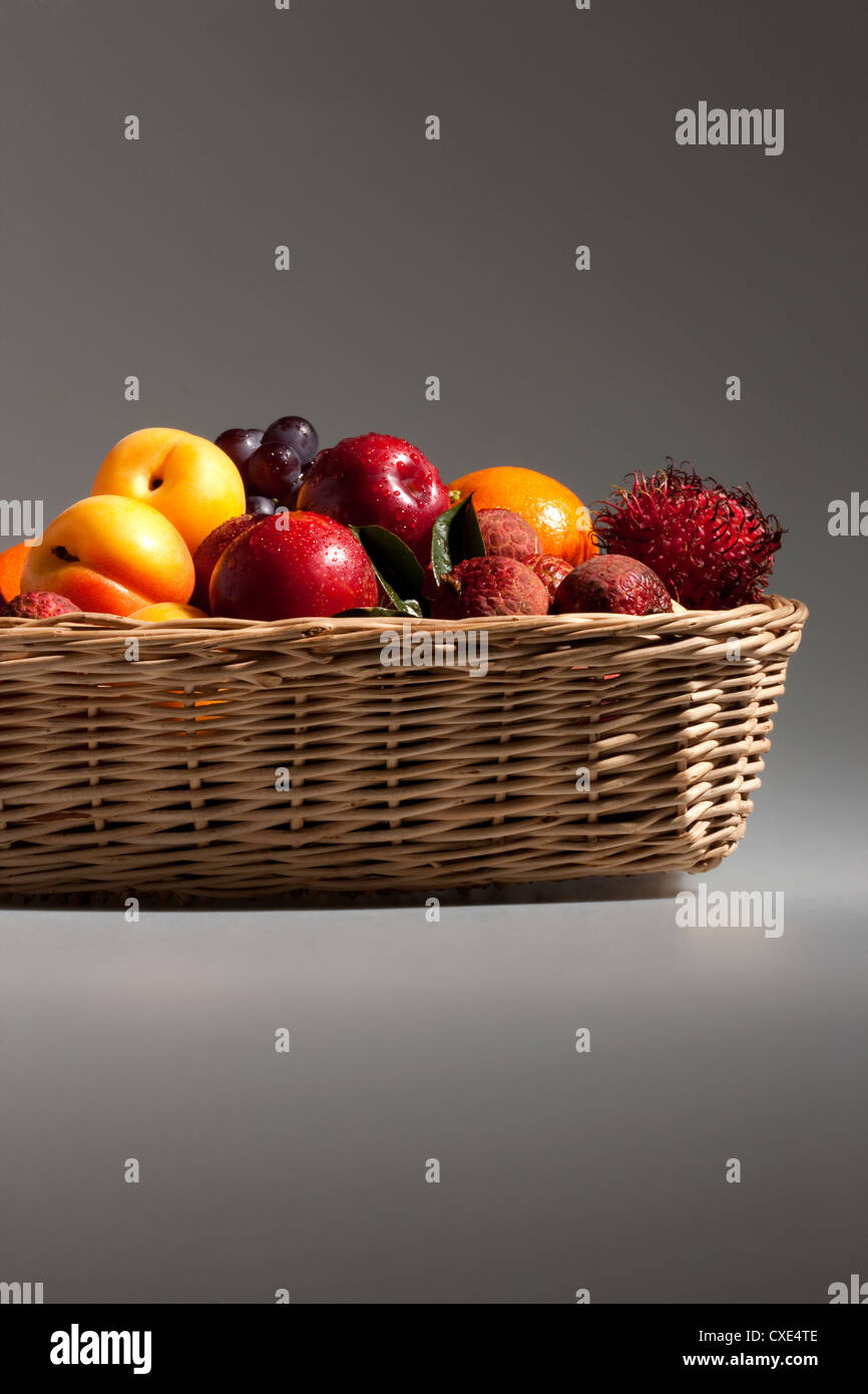 A pile of fruits in basket Stock Photo - Alamy
