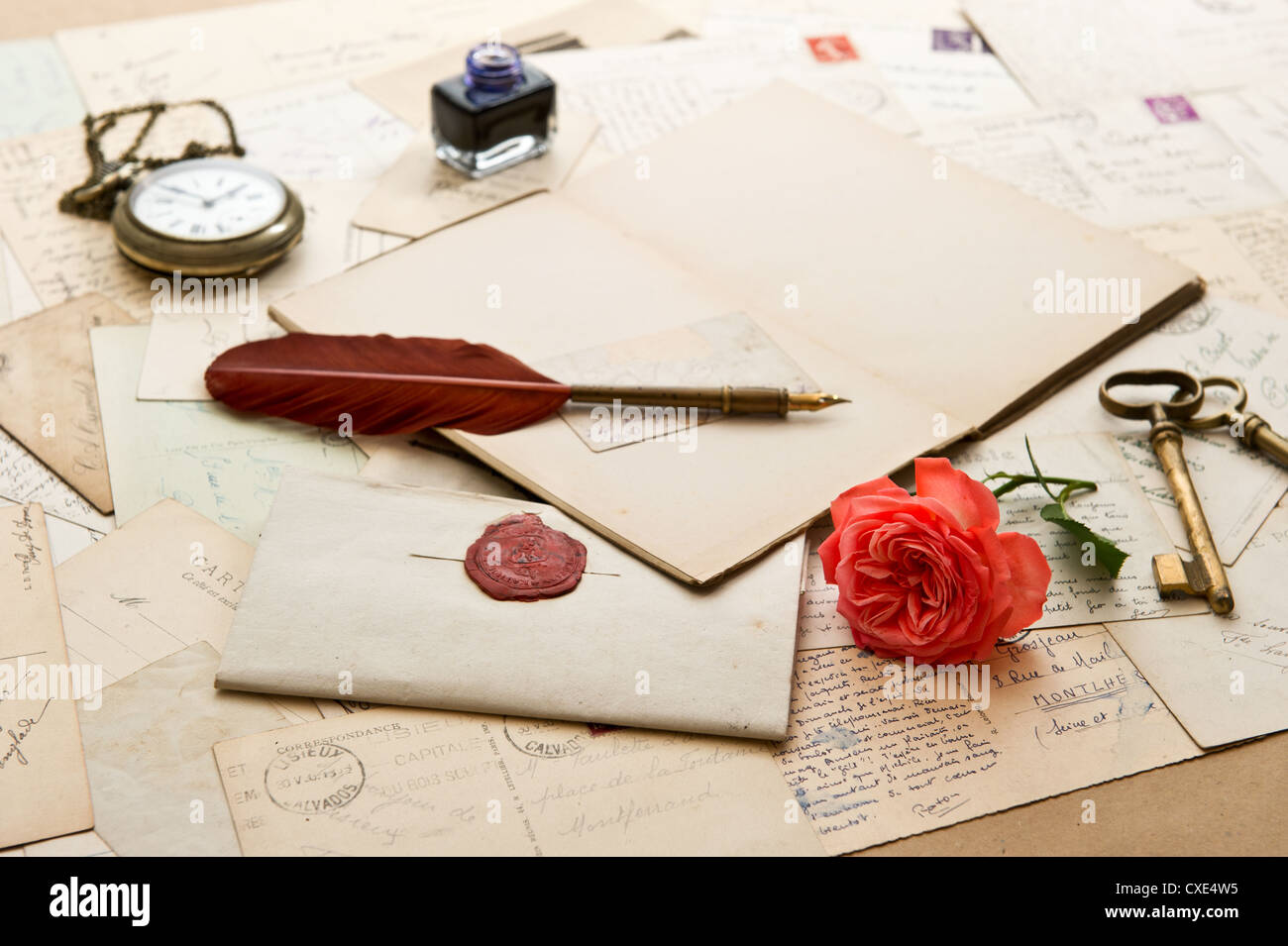 open book, old accessories and post cards. romantic vintage background ...