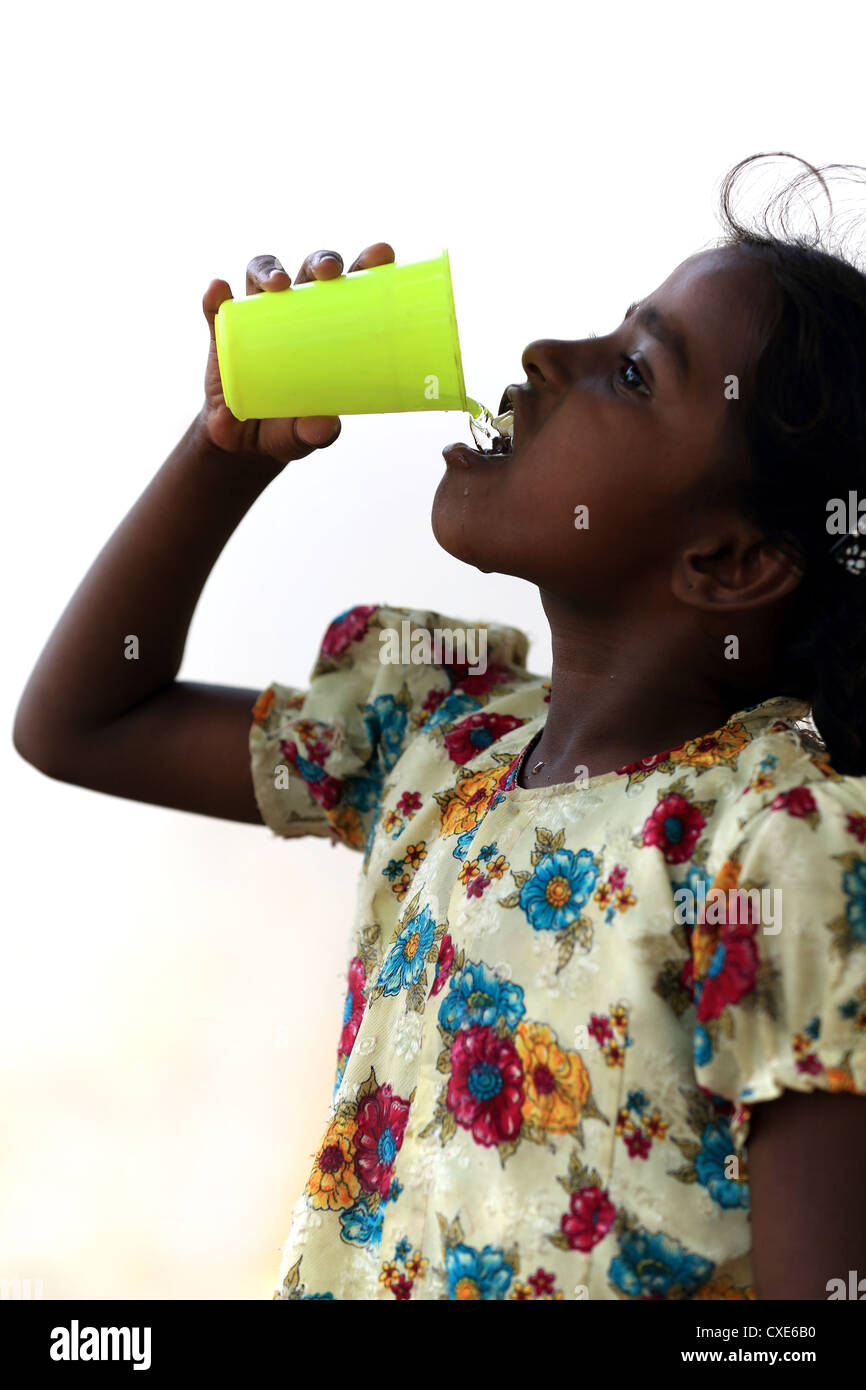 Indian school child drinking water during lunch break Andhra Pradesh ...