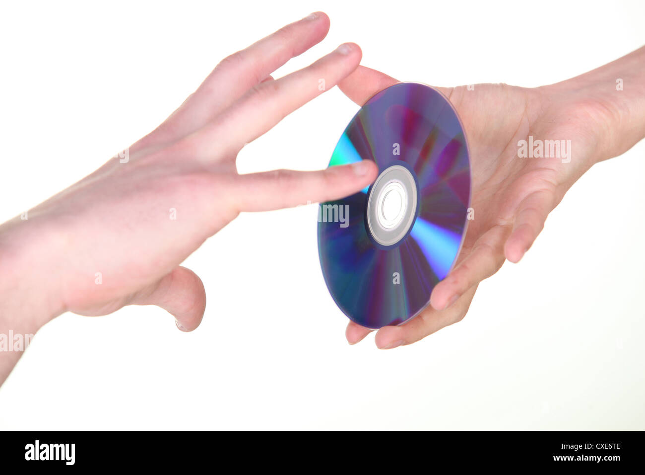 Hands holding CD Stock Photo - Alamy