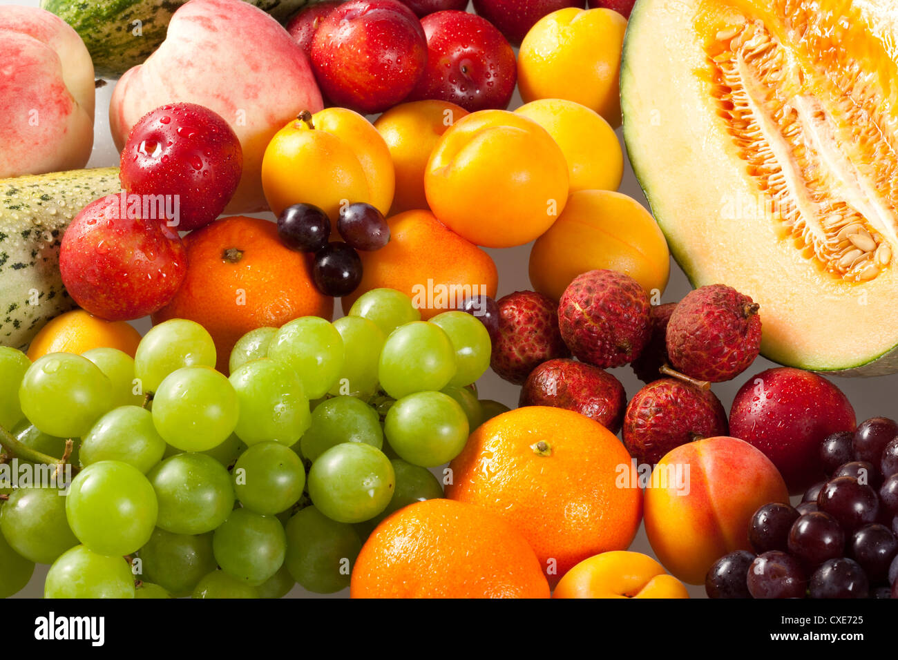 Close-up of a pile of fruits Stock Photo - Alamy