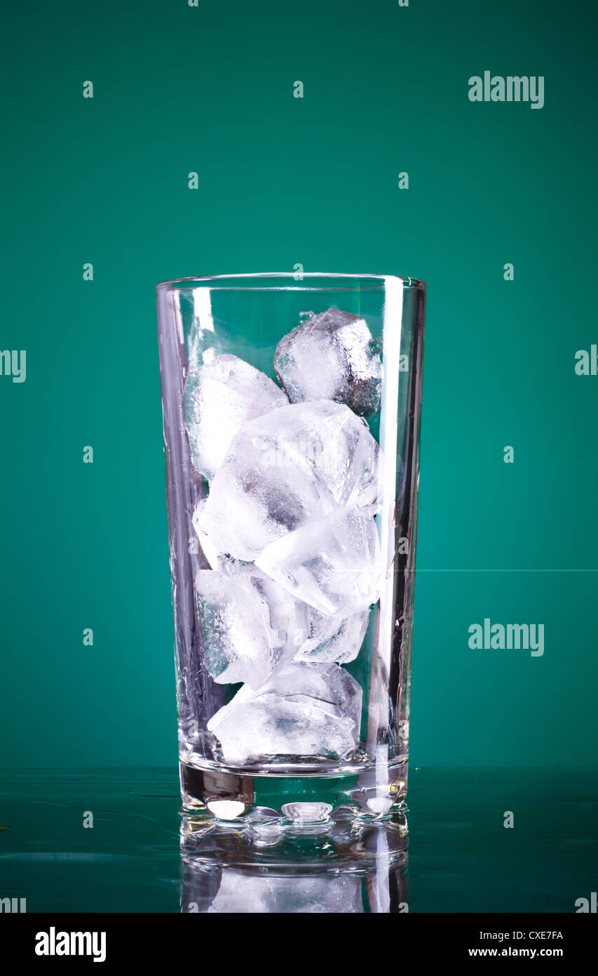 Glass With Glass Cubes Stock Photo - Alamy
