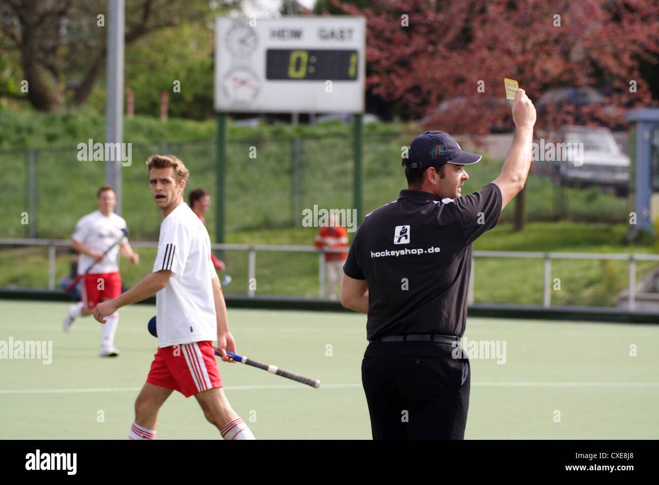 Hockey player referee hi-res stock photography and images - Alamy