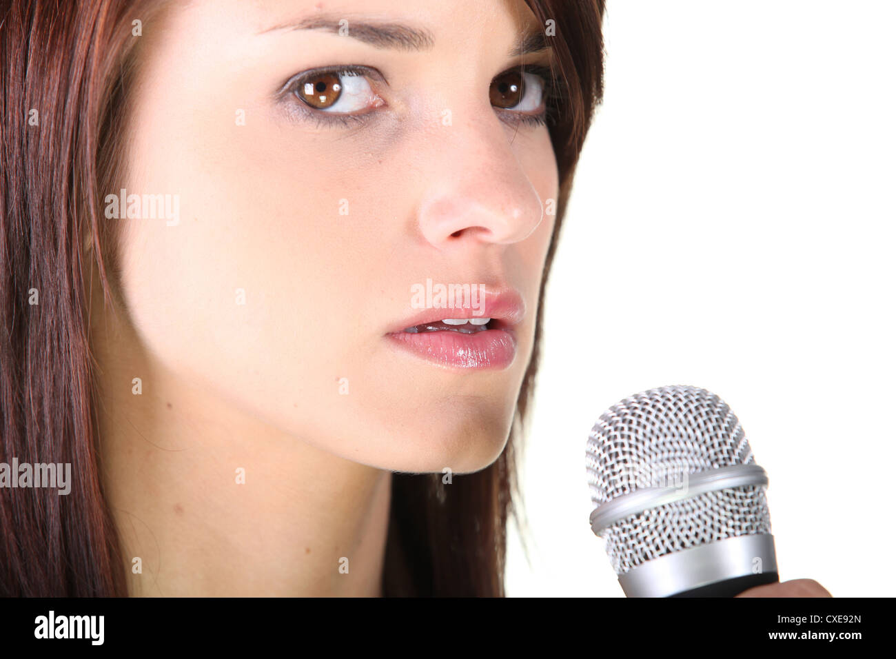 Hand holding microphone mouth singing hi-res stock photography and ...