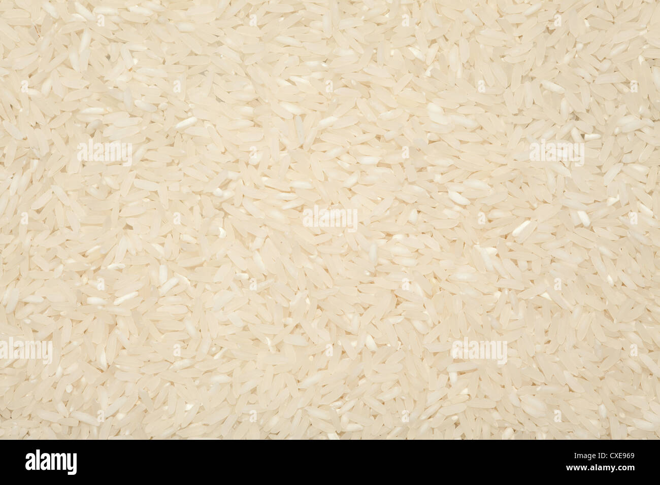 long grain white rice background, food texture Stock Photo - Alamy