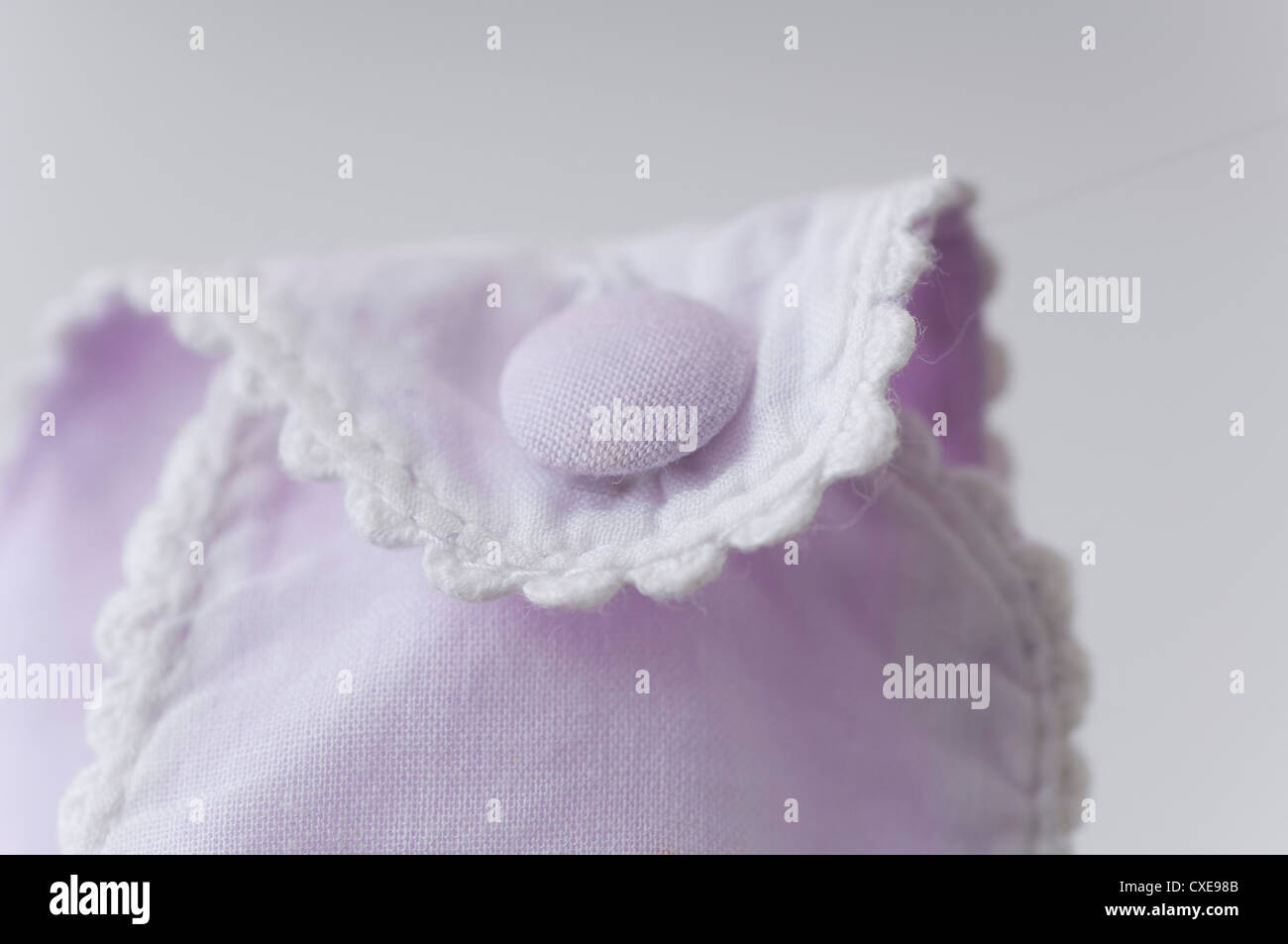 Button snap hi-res stock photography and images - Alamy