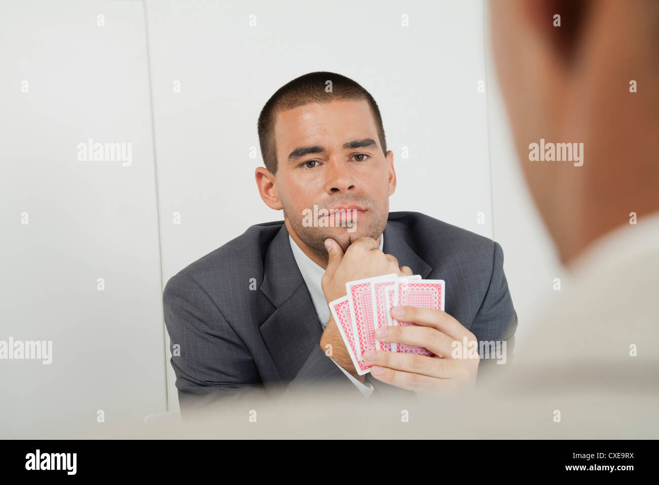 Men playing cards Stock Photo - Alamy