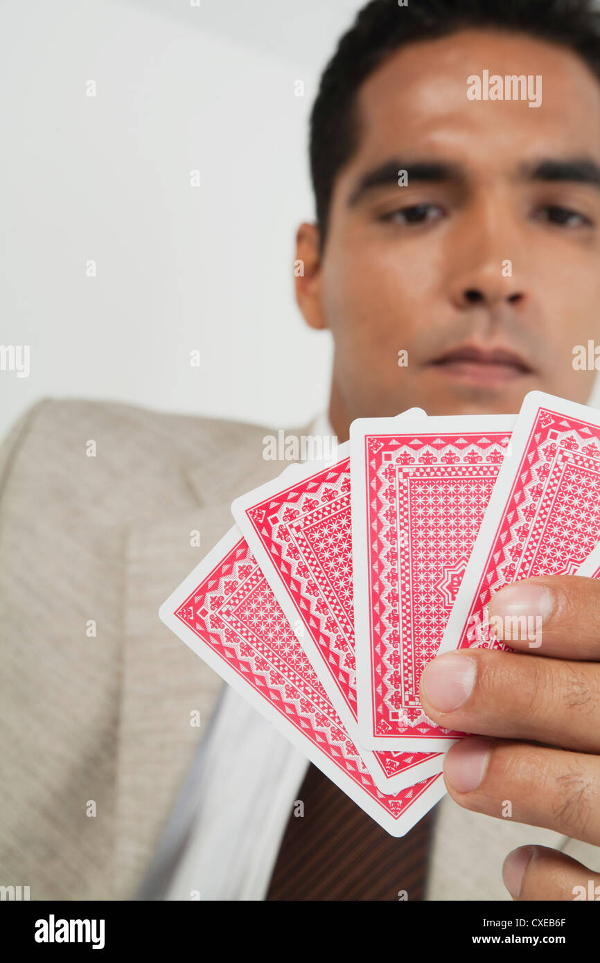 Man playing card game Stock Photo - Alamy