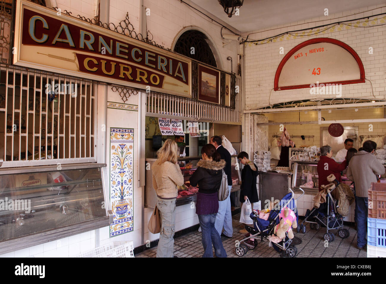 Cadiz, customers before the butcher's shop in the Market Hall Stock ...