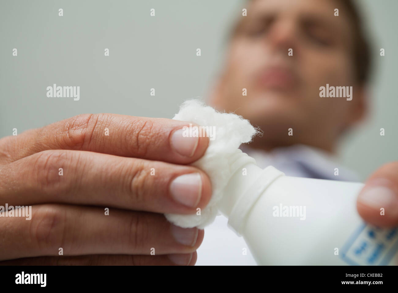 Person apply antiseptic on hand hi-res stock photography and images - Alamy
