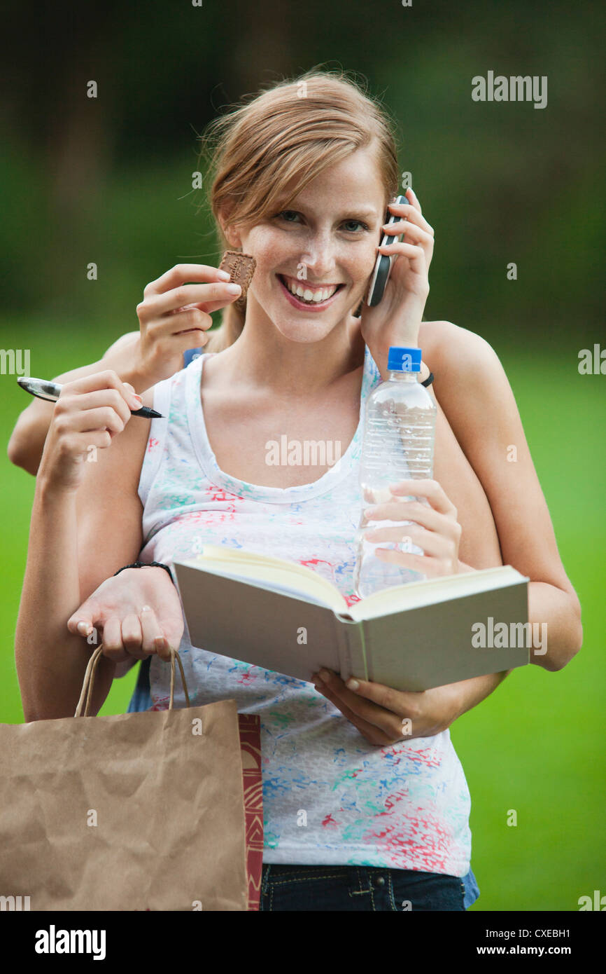 Women arms multitasking hi-res stock photography and images - Alamy