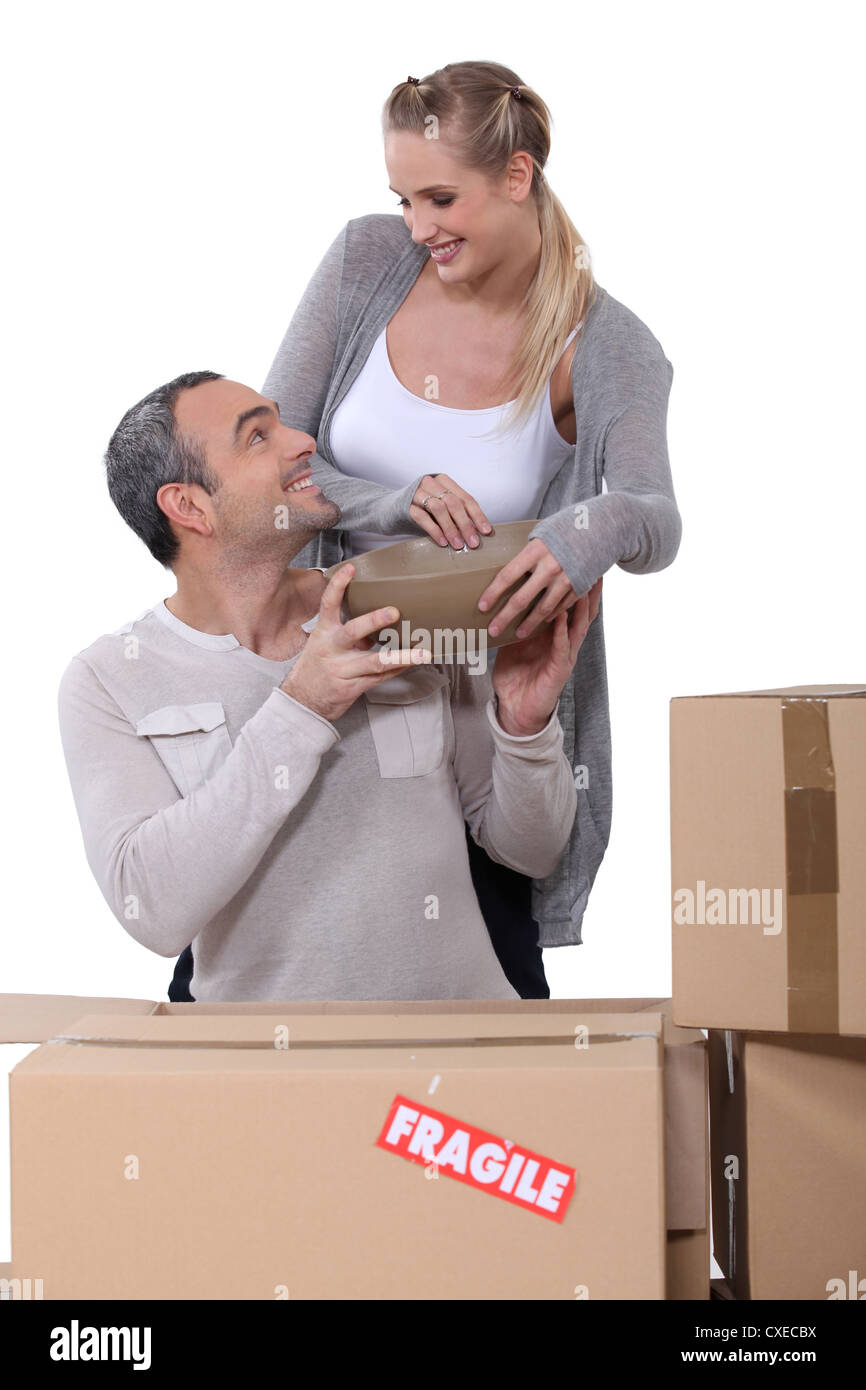 couple arranging their new apartment Stock Photo - Alamy