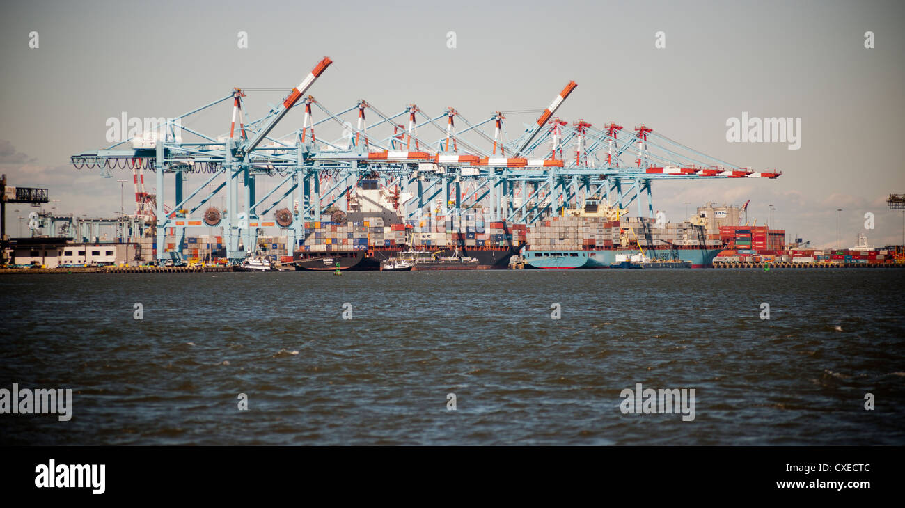 Container ships load and unload in Port Elizabeth in the New York and ...