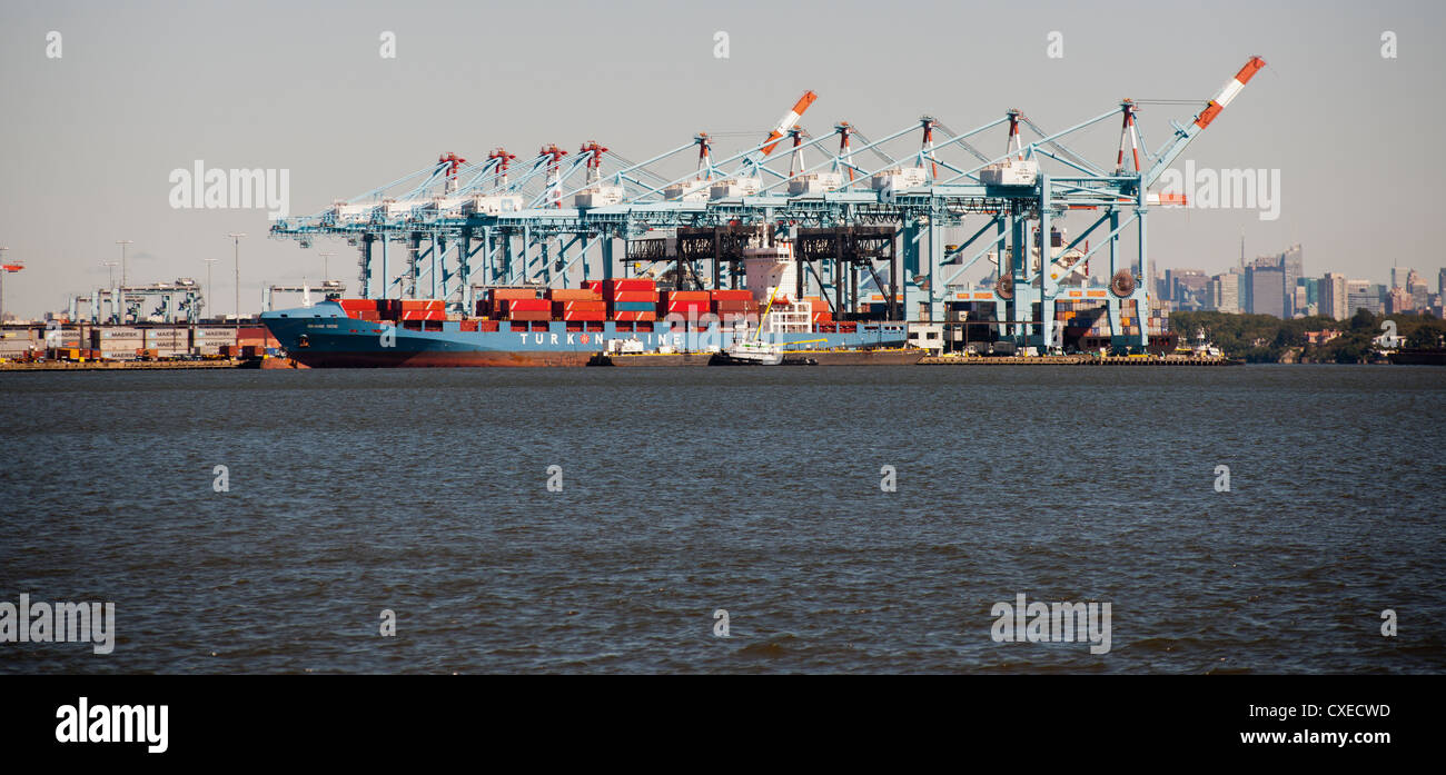 Container ships load and unload in Port Elizabeth in the New York and ...