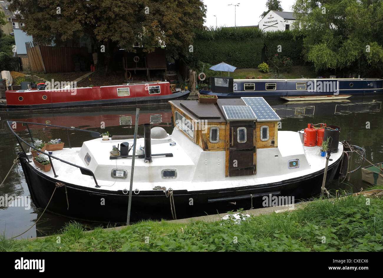 Converted lifeboat moored on river Cam by Jesus Green Cambridge England ...