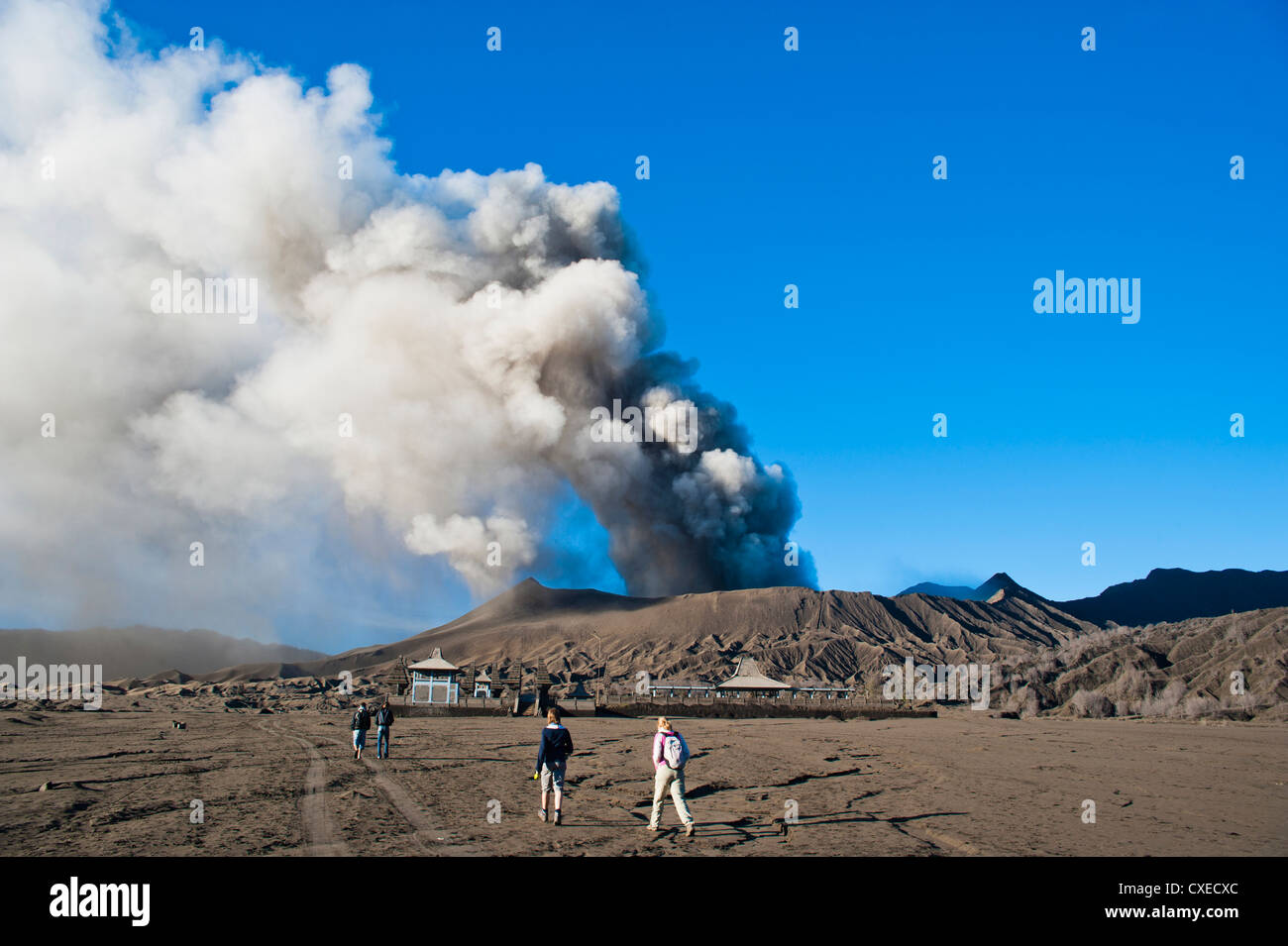 Tourists watching Mount Bromo volcanic eruption, East Java, Indonesia ...