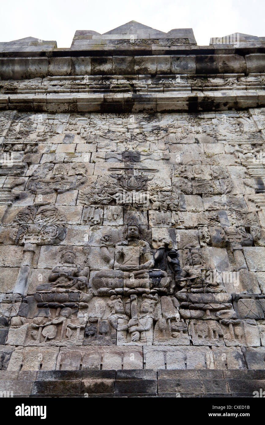 Wall Relief of the Buddhist Temple Candi Mendut in Indonesia Stock ...