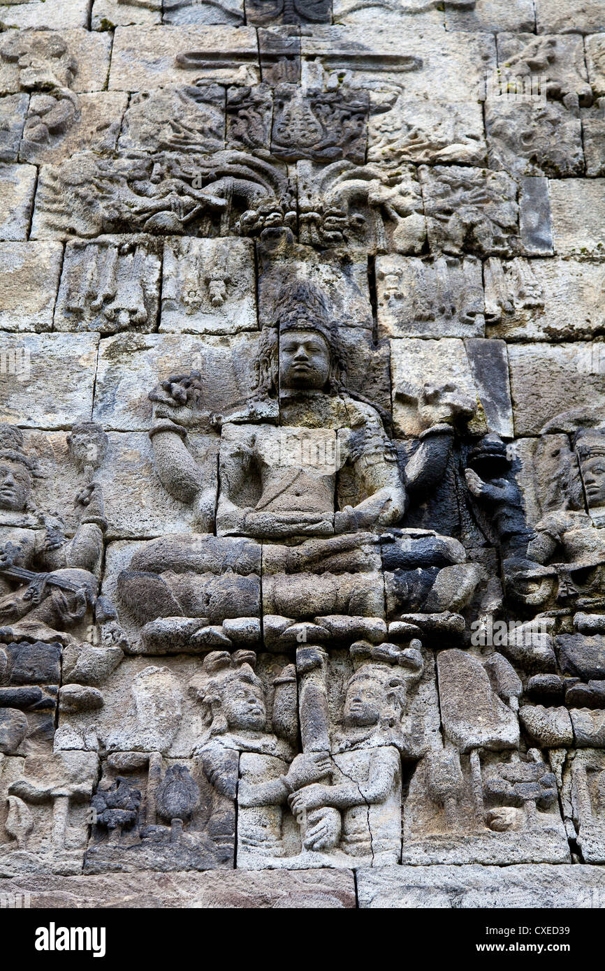 Wall Relief of the Buddhist Temple Candi Mendut in Indonesia Stock ...