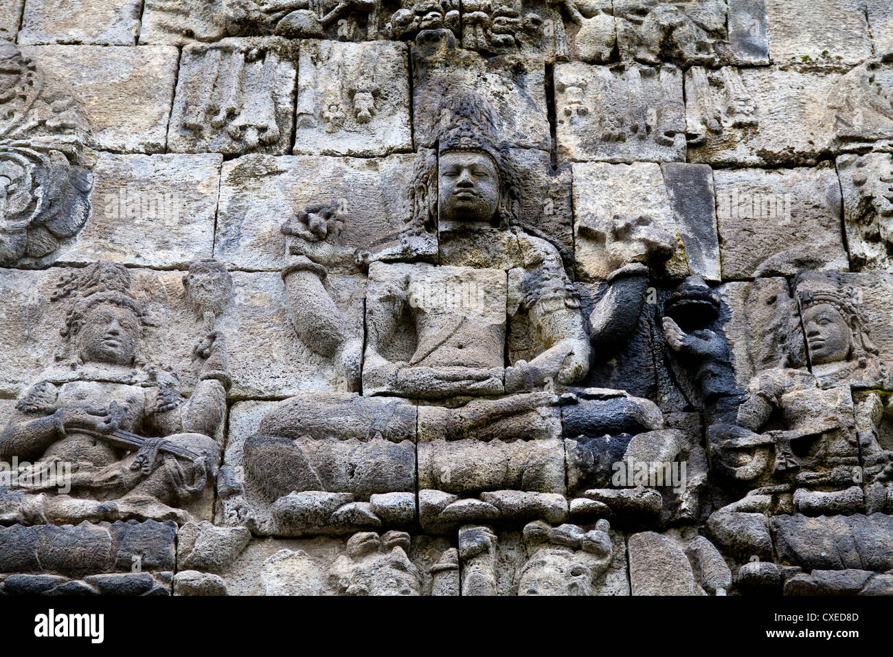 Wall Relief of the Buddhist Temple Candi Mendut in Indonesia Stock ...