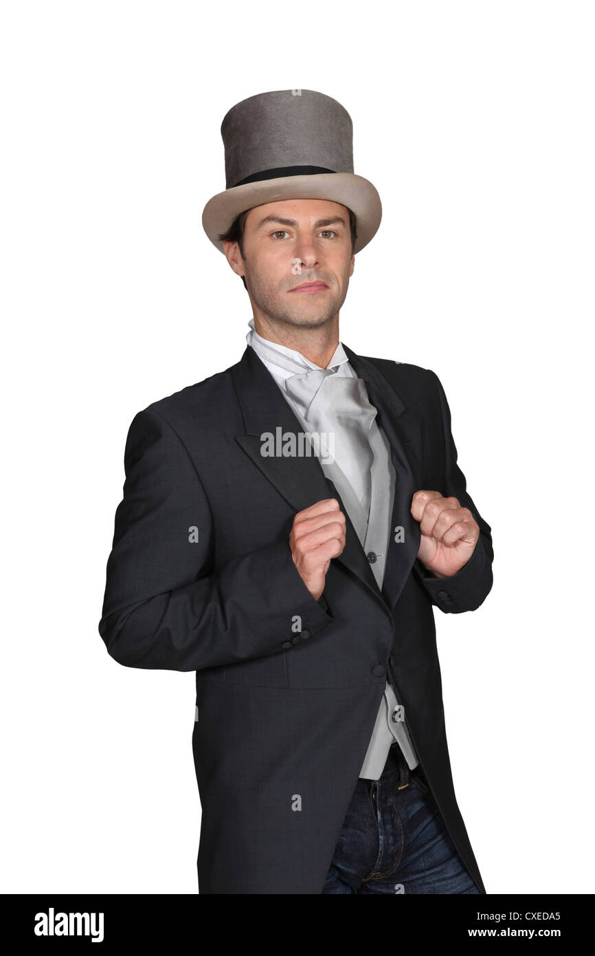 Wearing suit and top hat hi-res stock photography and images - Alamy