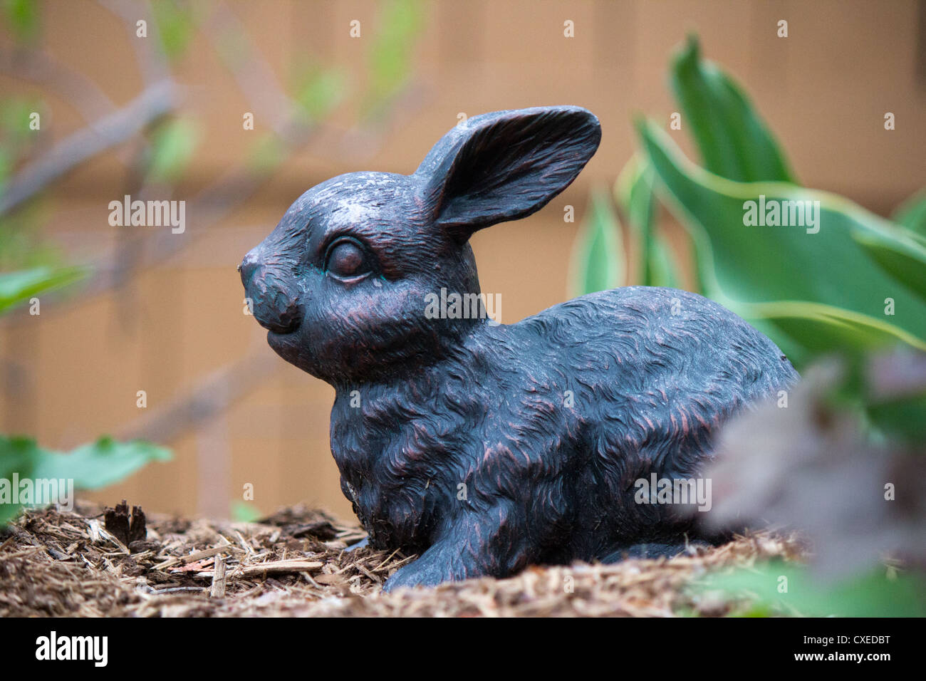 Bunny decoration in the garden Stock Photo - Alamy